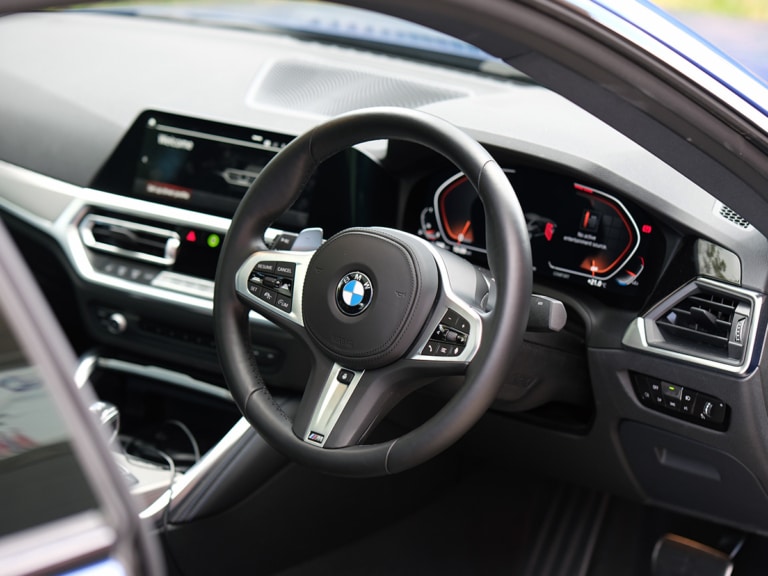 2022 BMW 230i Review | Man of Many