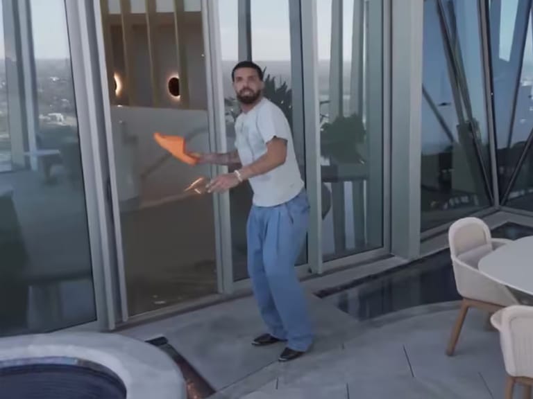Where to Buy the $50 Slide Drake Threw From His Sydney Penthouse Balcony | Man of Many